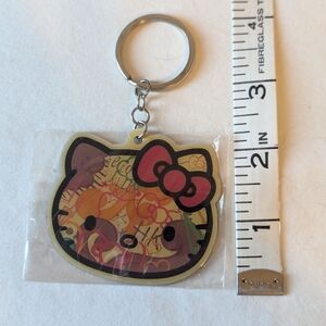 Hello Kitty | Accessories | Hello Kitty Face Metal And Enamel Keychain ...
